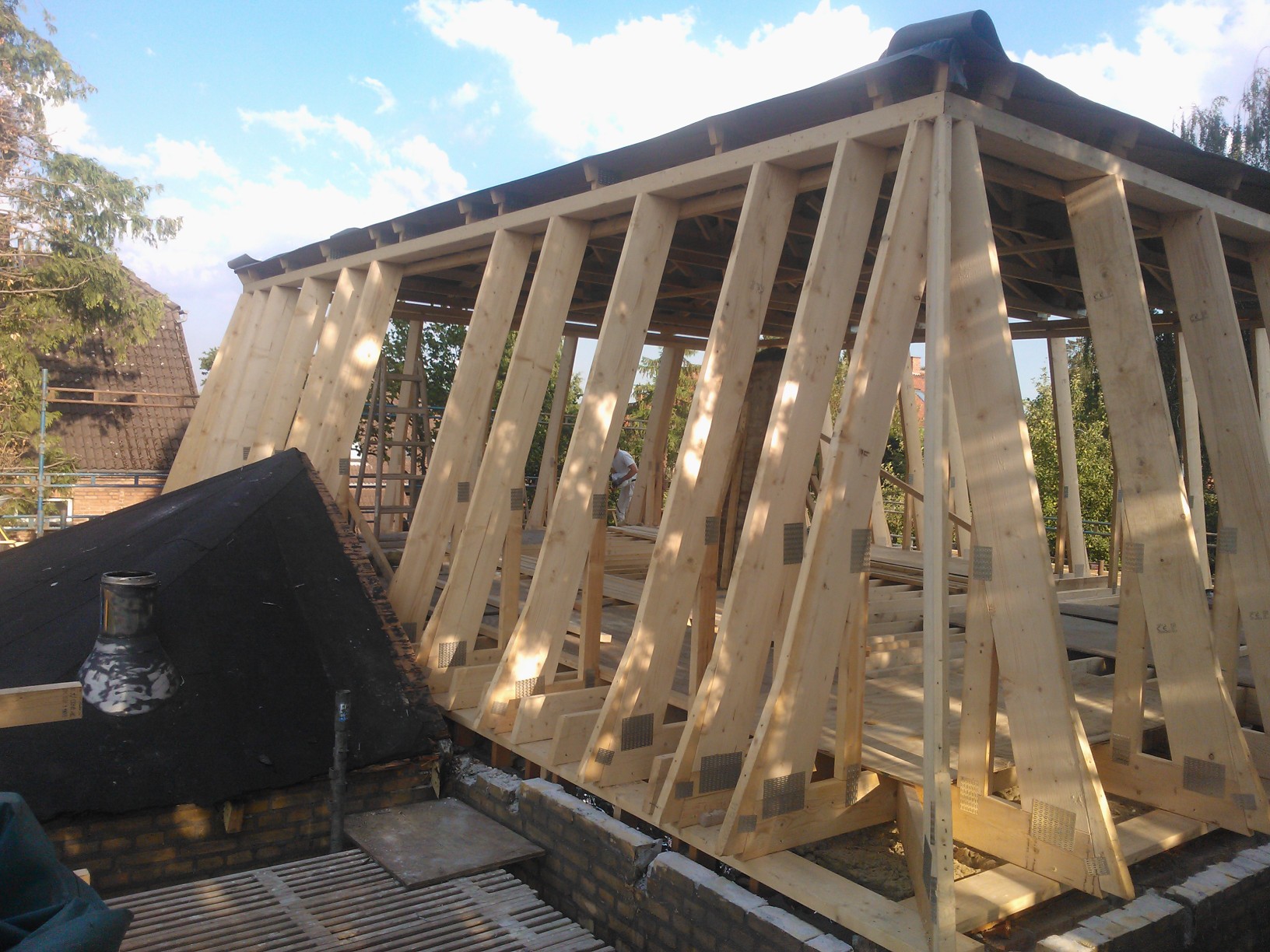 Nyt mansardtag med sorte lertegl vanløse - Sjællands Tømrerentreprise A/S